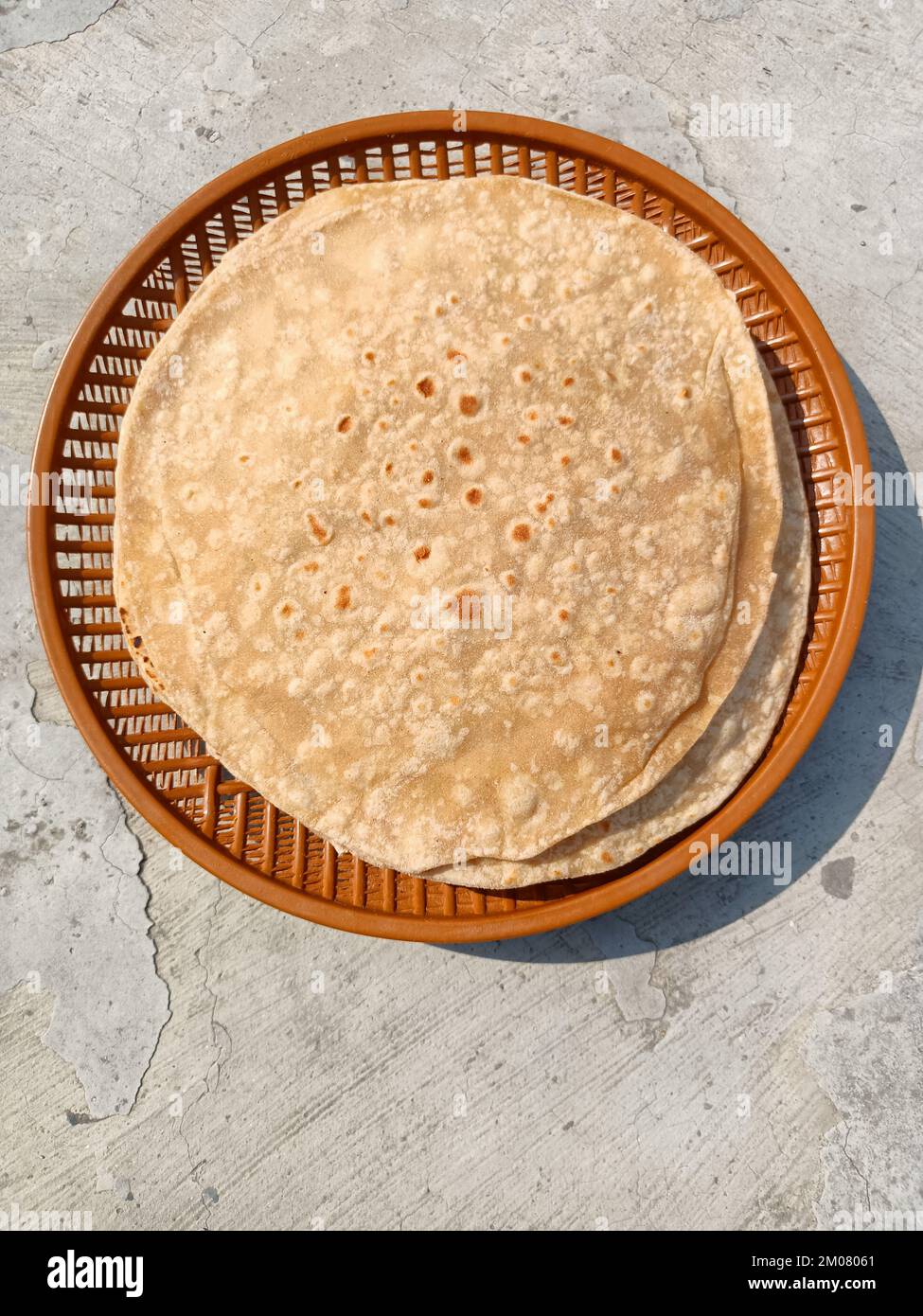 Chapati, also known as roti, rotli, safati, shabaati, phulka, chapo ...