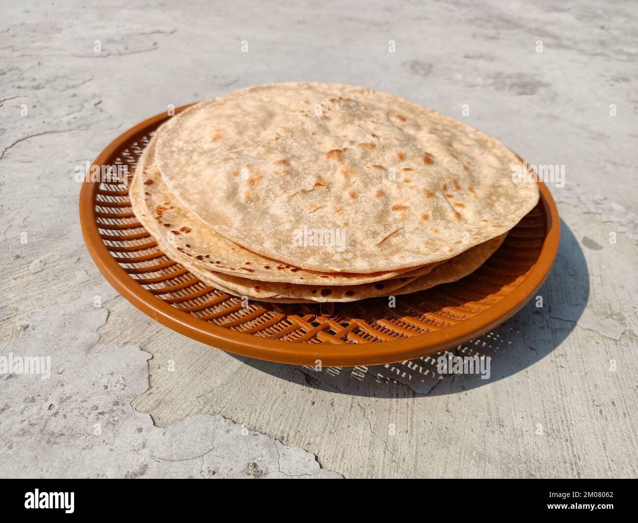 Chapati, also known as roti, rotli, safati, shabaati, phulka, chapo ...