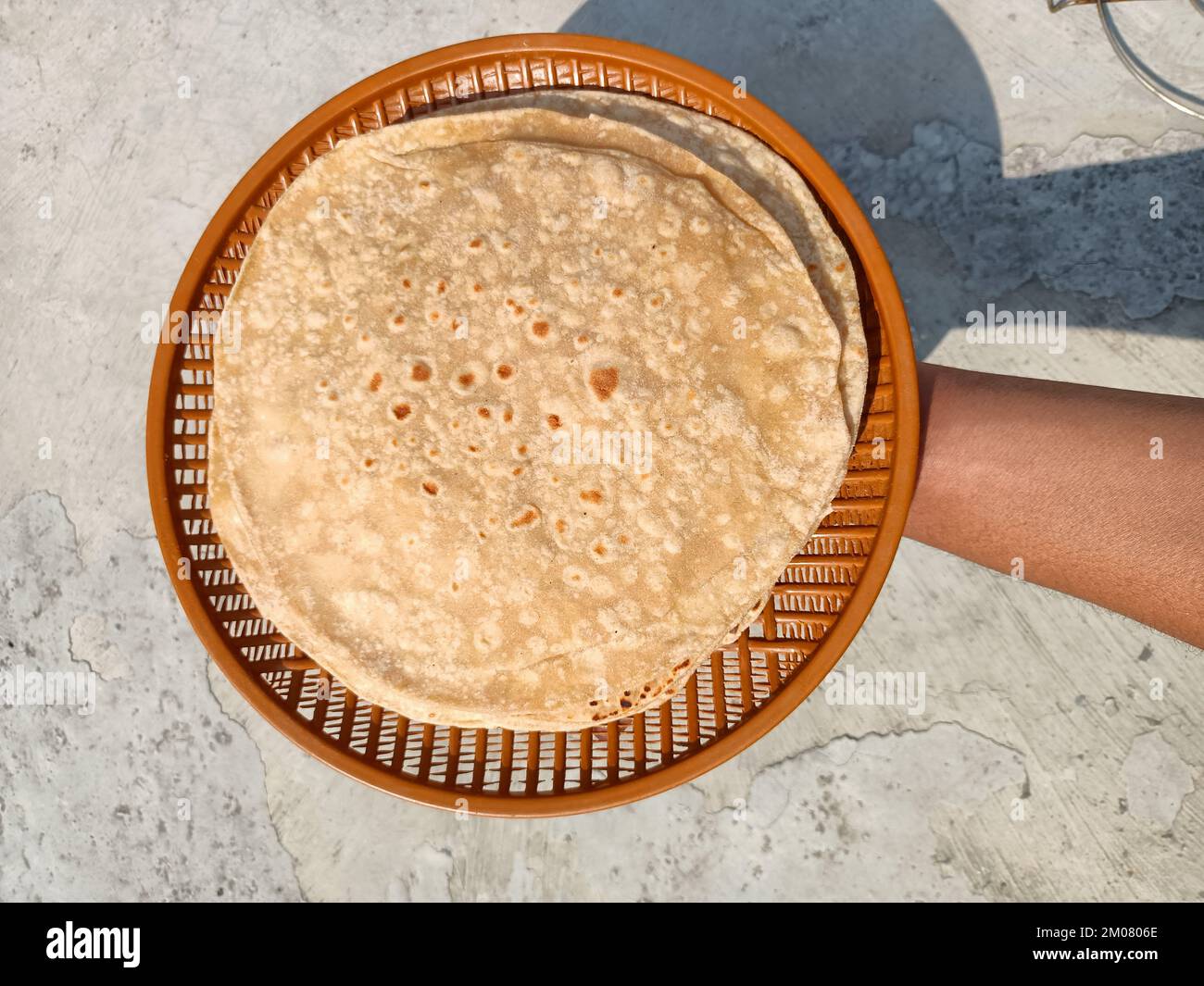 Chapati, also known as roti, rotli, safati, shabaati, phulka, chapo ...