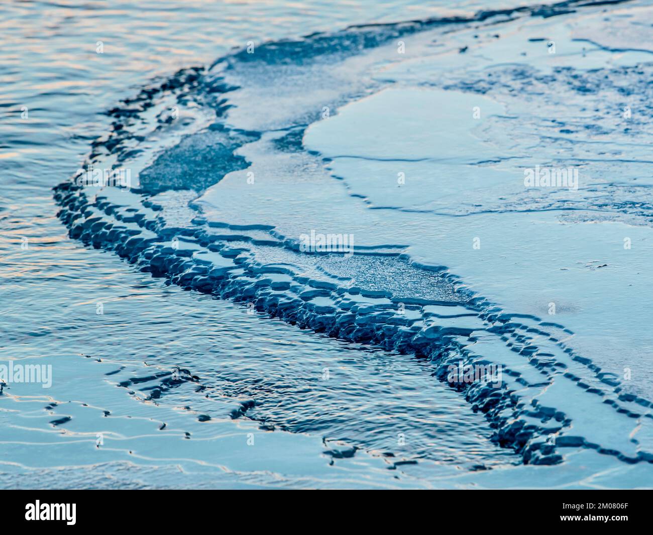 The high-angle view of the blue half-frozen water - marine ice Stock ...