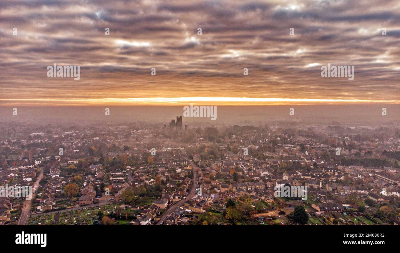 The 'Ship of the Fens', Ely Cathedral, stands proud above mist and fog ...