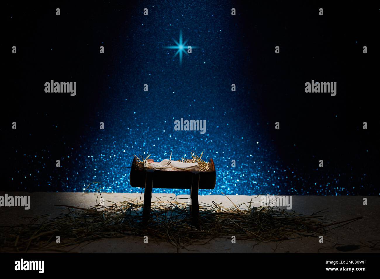 Nativity of Jesus, empty manger at night with bright lights Stock Photo ...