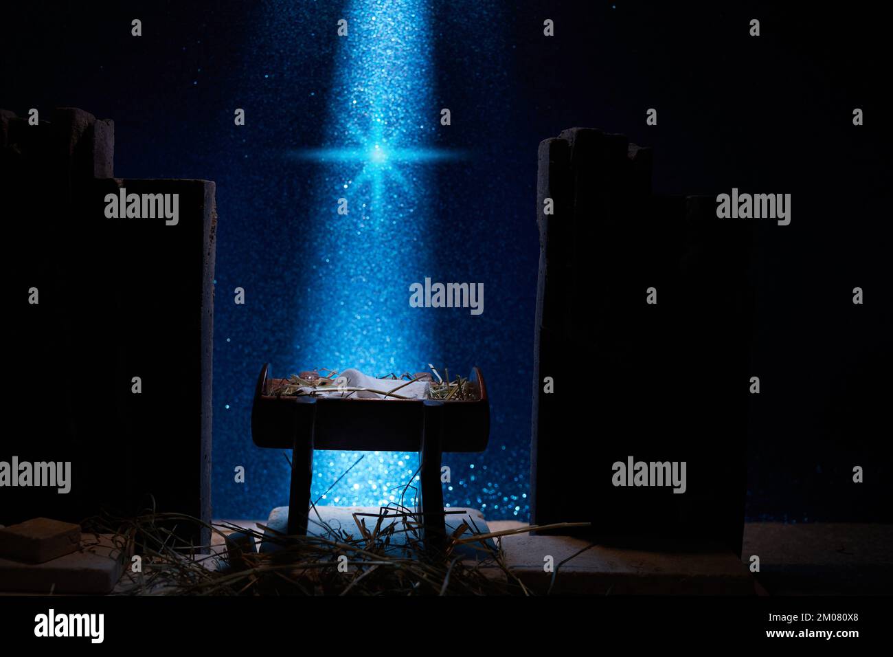 Nativity of Jesus, empty manger at night with bright lights Stock Photo ...