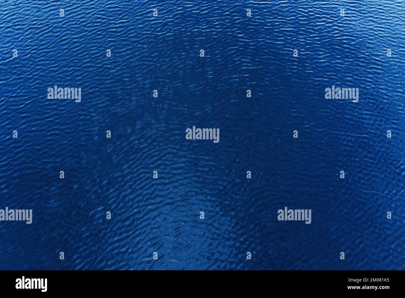 Blue river water surface with ripples and light reflection. Texture of ...