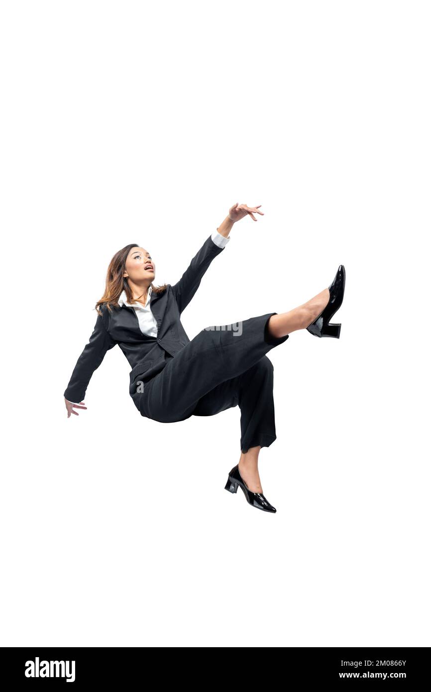 Asian businesswoman falling down isolated over white background Stock ...