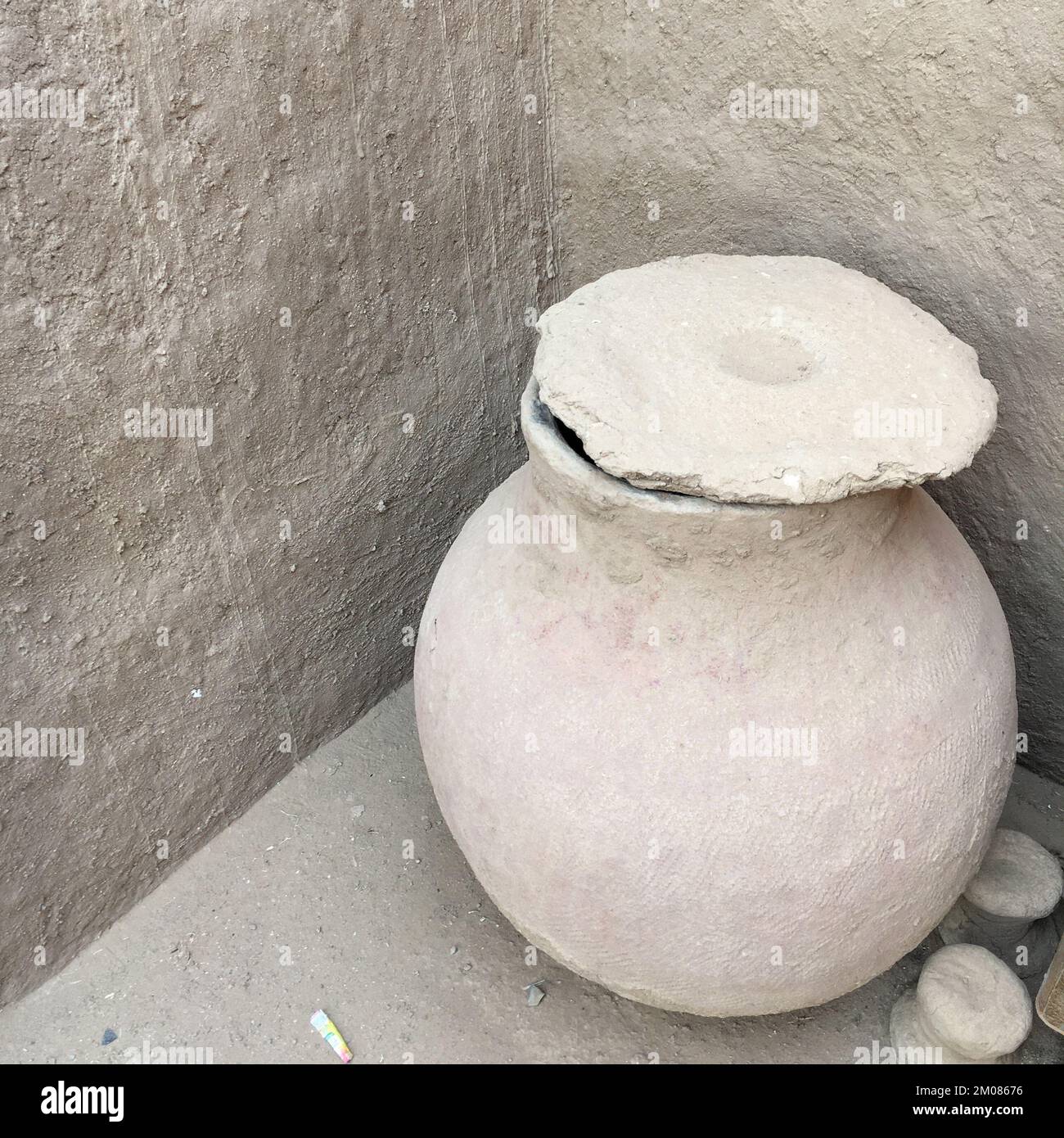 The high-angle view of an old food storing jug in a basement Stock ...