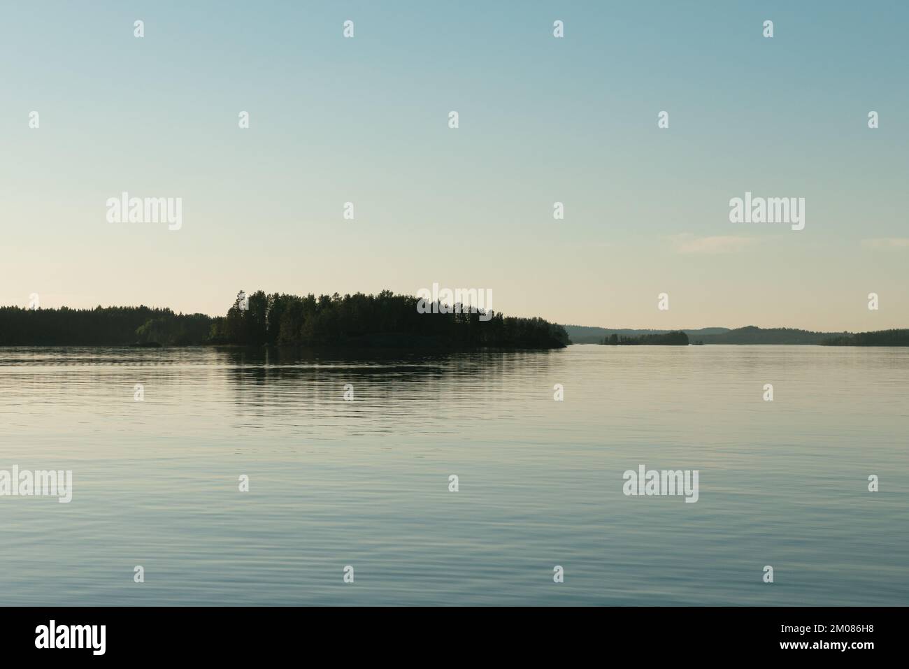 Mid summer in lake of Saimaa in evening Stock Photo - Alamy