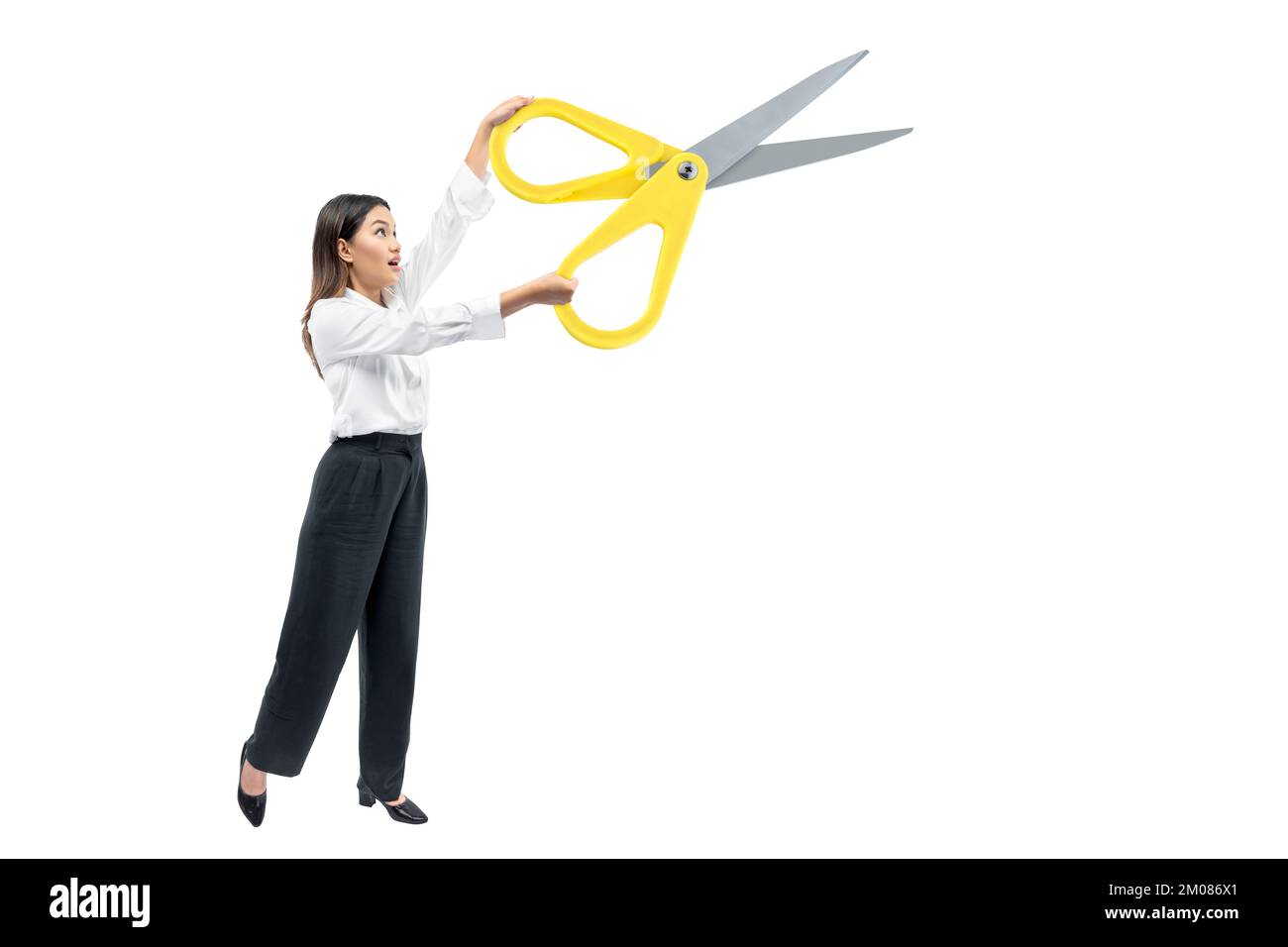 White scissors with asian hand hi-res stock photography and images - Alamy