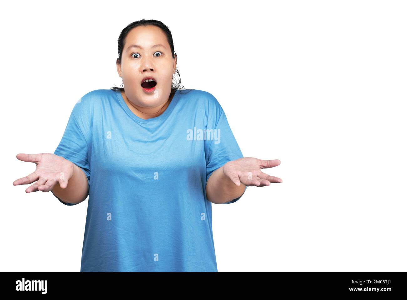Asian fat overweight woman with a shocked expression isolated over ...