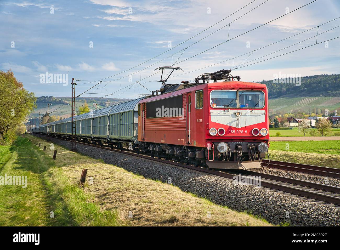 A Retzbach Zellingen 152 train on the railway with a field in the ...