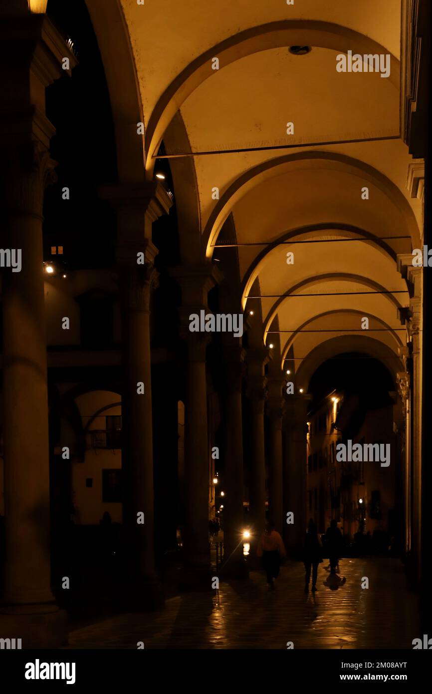 An arched corridor with columns in Florence Stock Photo - Alamy
