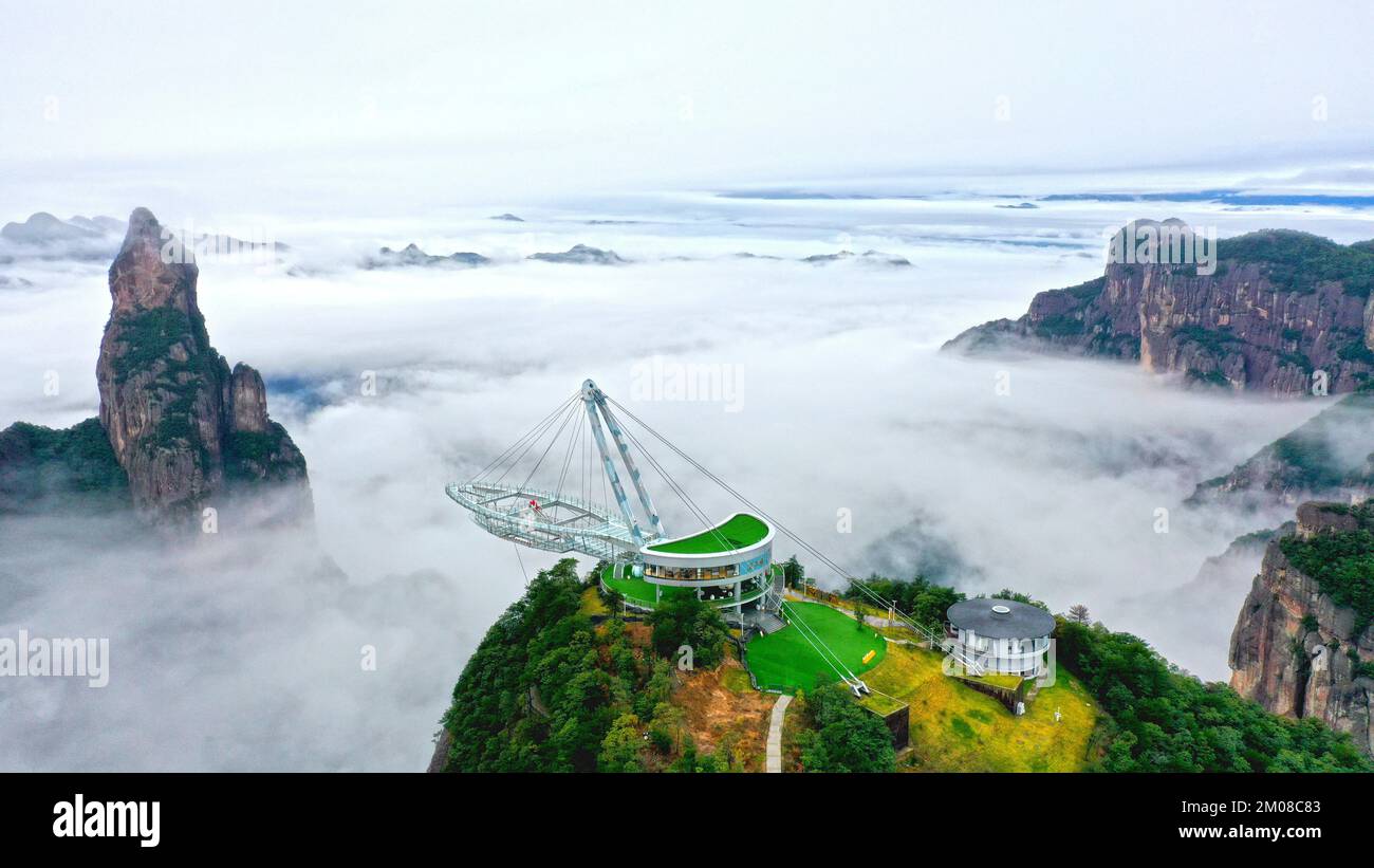 Aerial photos show the misty scenery of the Shenxianju Scenic Area ...