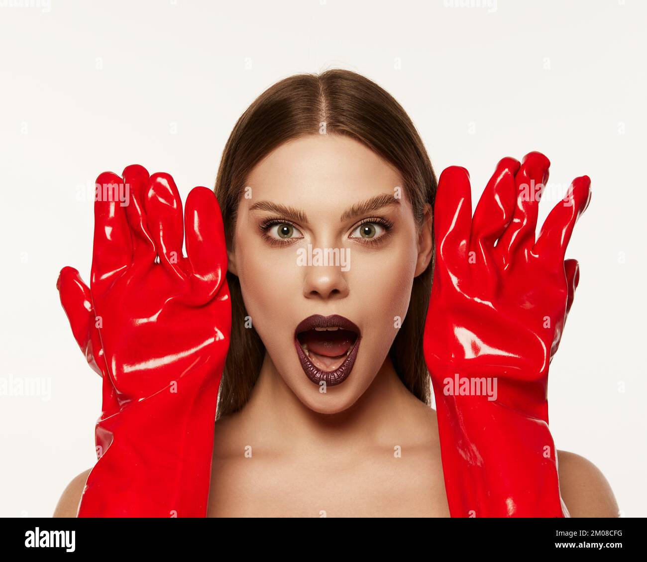 Portrait of beautiful young woman with straight brown hair and dark ...