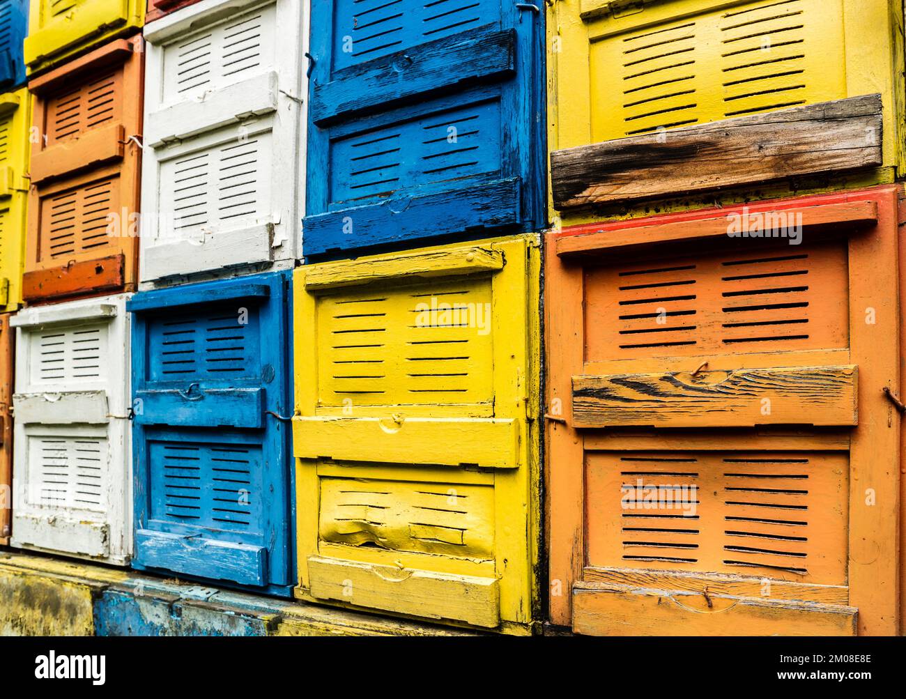 Colorful wooden beehive in the garden Stock Photo - Alamy