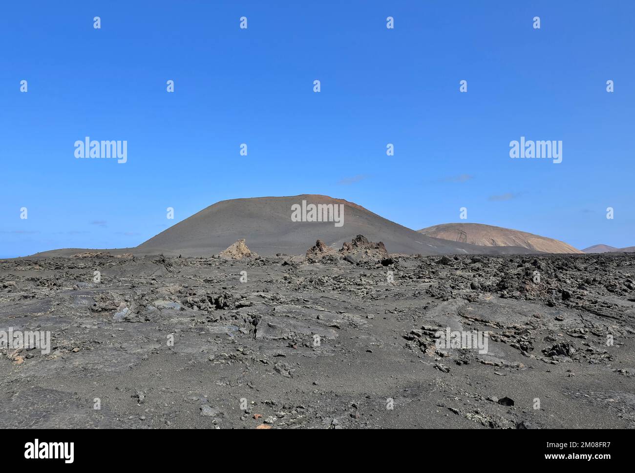 Mountain range with volcanoes in Timanfaya National Park, Lanzarote ...