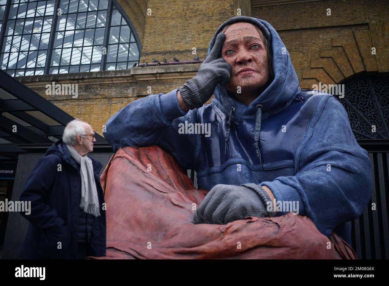 Jonathan Pryce looks at a 4.3 metre tall hyper-real sculpture of a ...