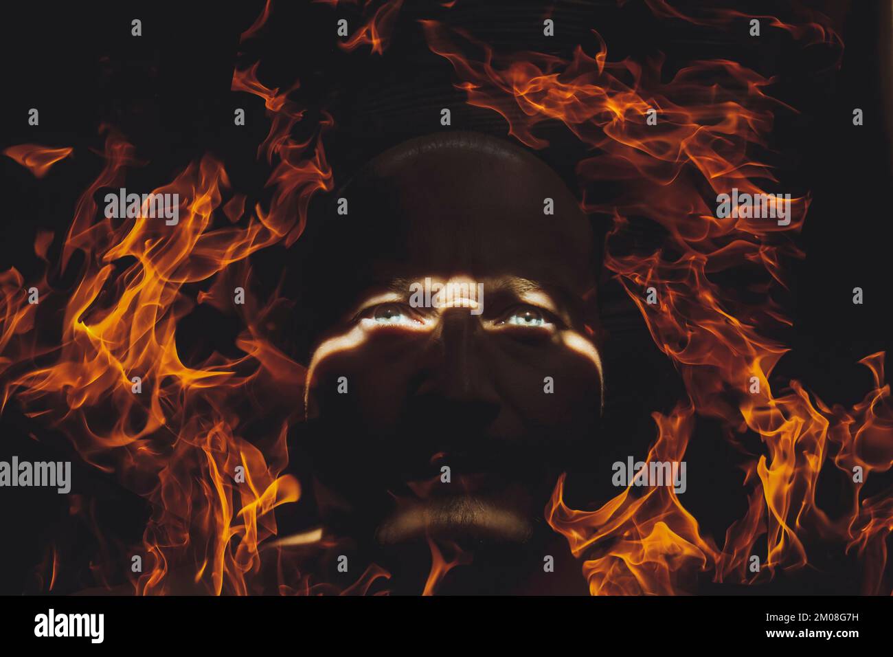 Fire light on face hi-res stock photography and images - Alamy