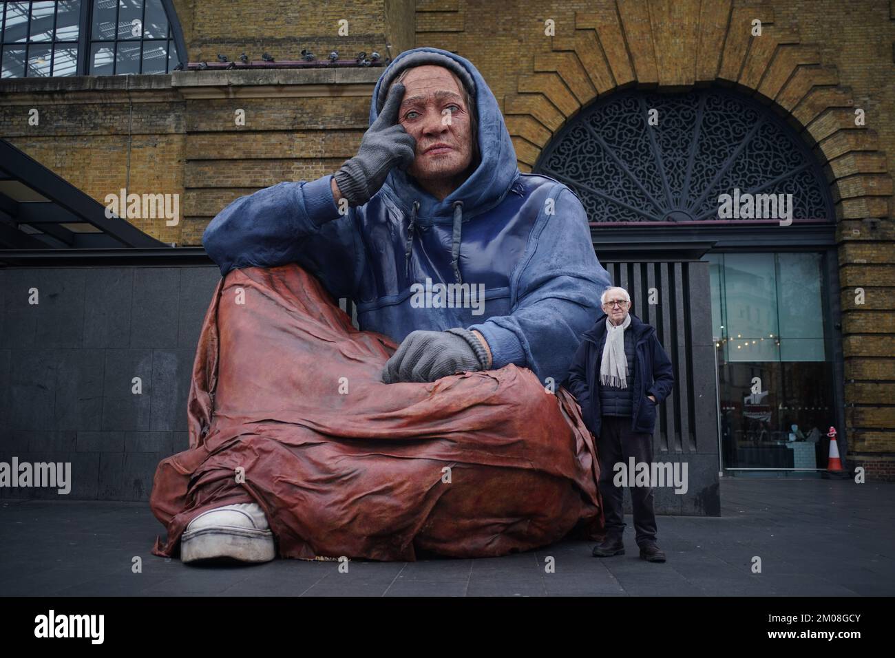 Jonathan Pryce looks at a 4.3 metre tall hyper-real sculpture of a ...