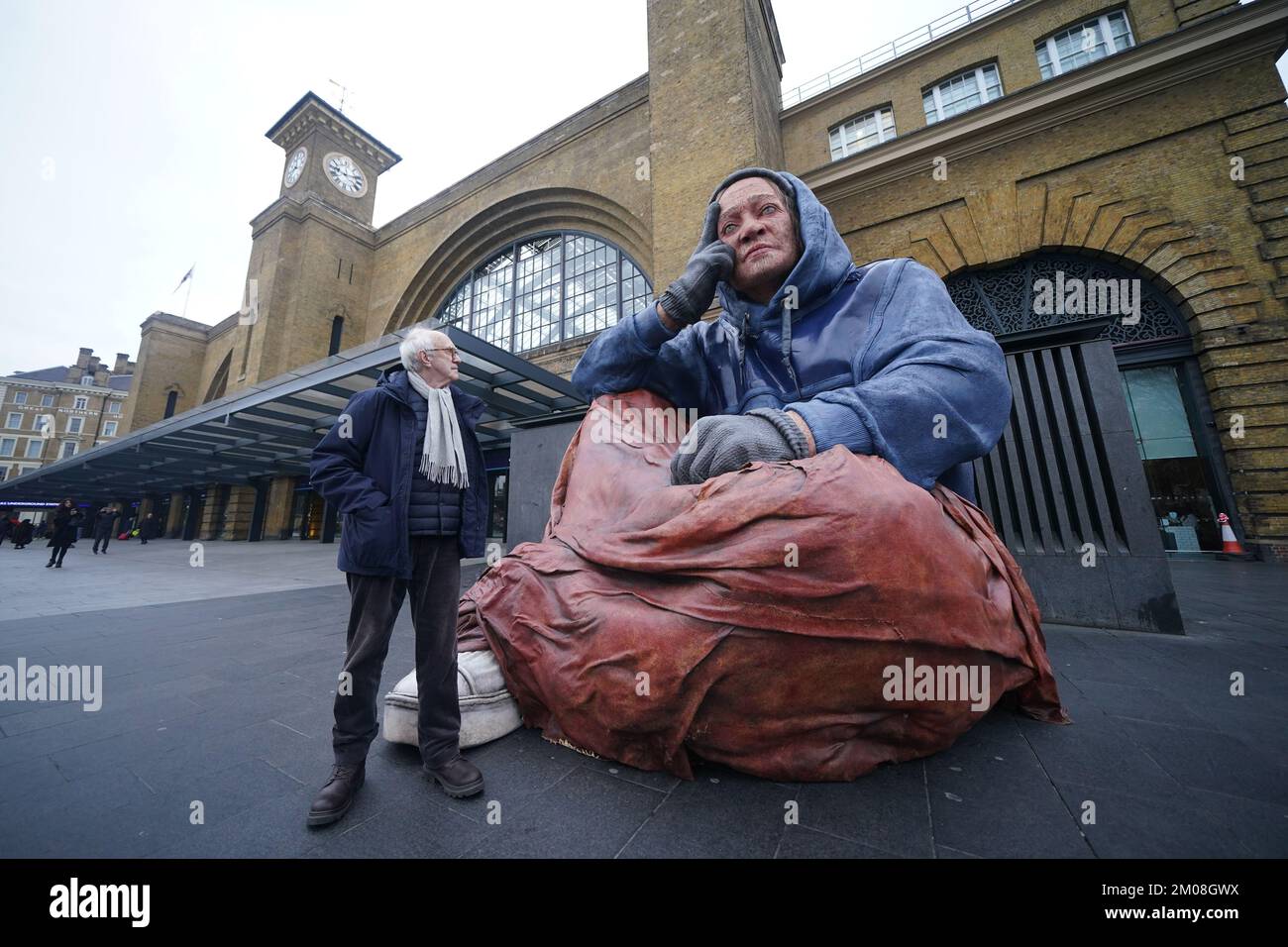Jonathan Pryce looks at a 4.3 metre tall hyper-real sculpture of a ...
