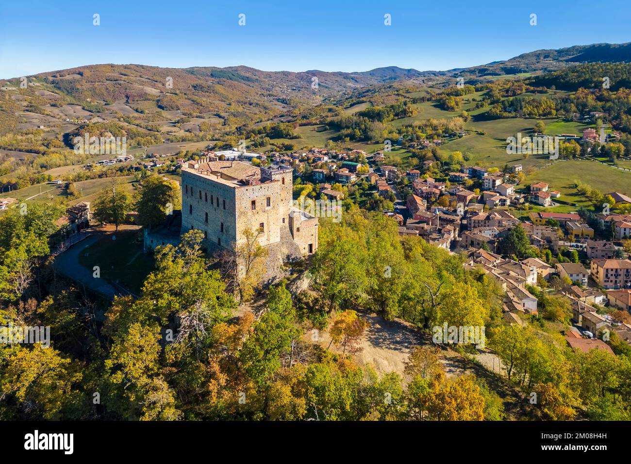 Aerial view of the Castello dal Verme in Zavattarello town in autumn ...