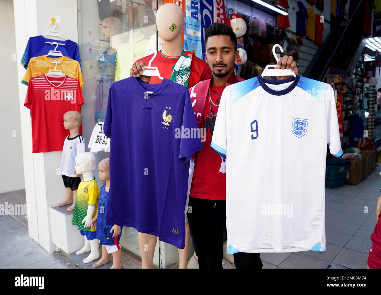 A store selling England and France shirts in the Souq area of Doha ...