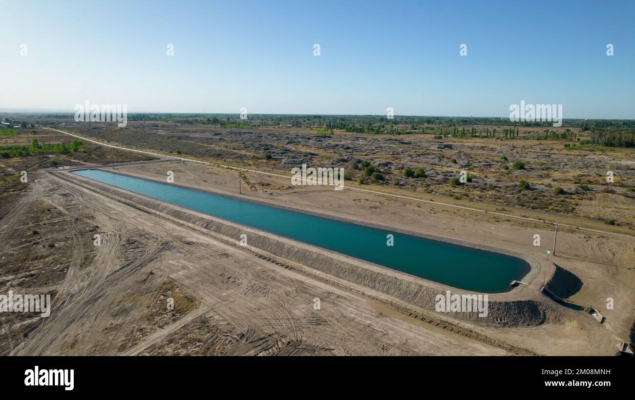 An aerial view of artificial water reservoir for agricultural ...