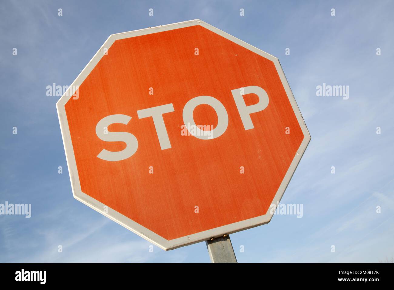 Red Stop Sign in Rural Setting on Diagonal Tilt Stock Photo - Alamy