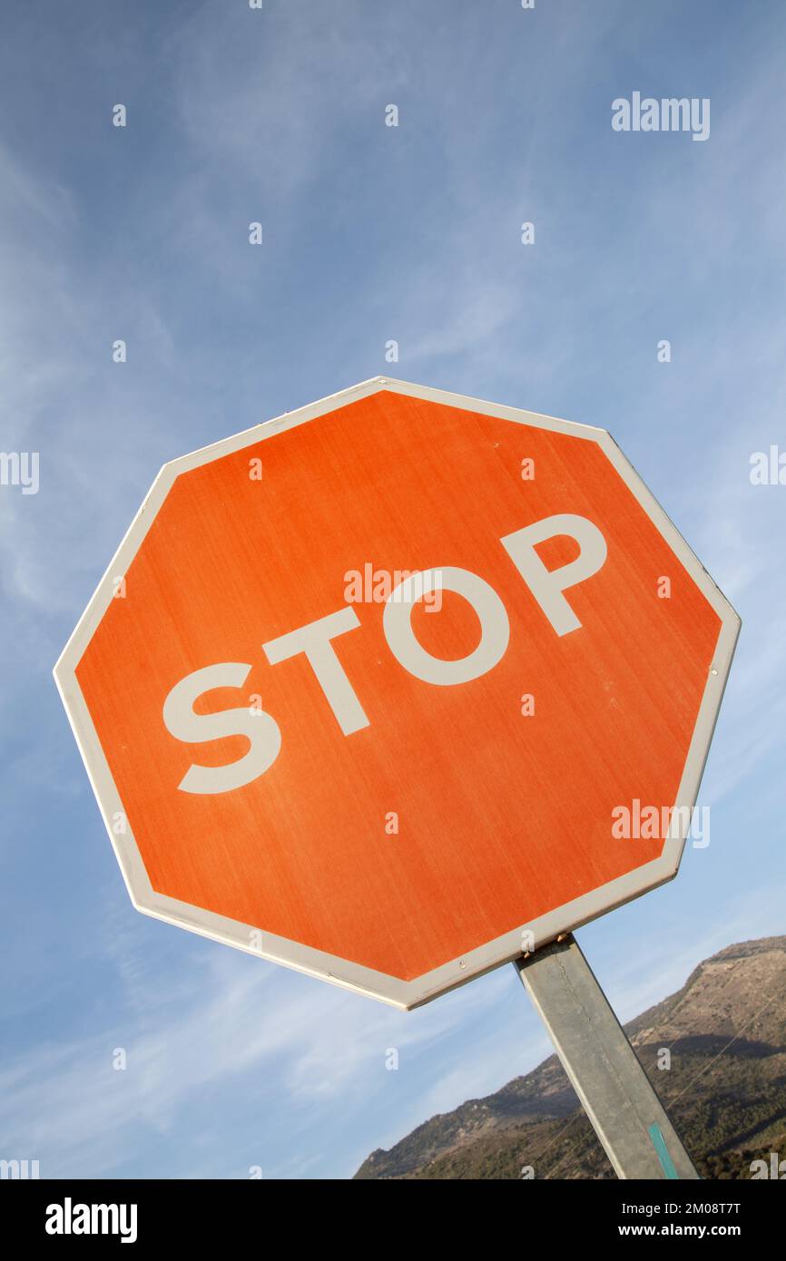 Red Stop Sign in Rural Setting on Diagonal Tilt Stock Photo - Alamy
