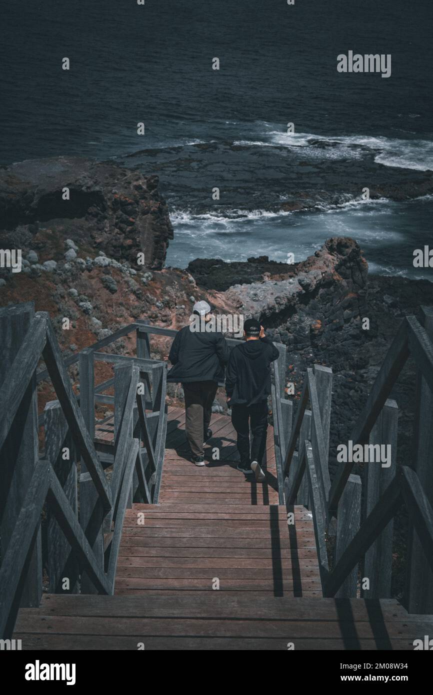 Aerial view two men walking hi-res stock photography and images - Alamy