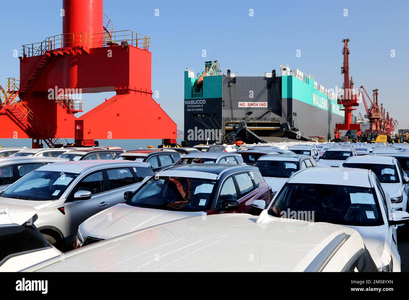 Aerial photo shows a roll-on/roll-off ship loading export vehicles at ...