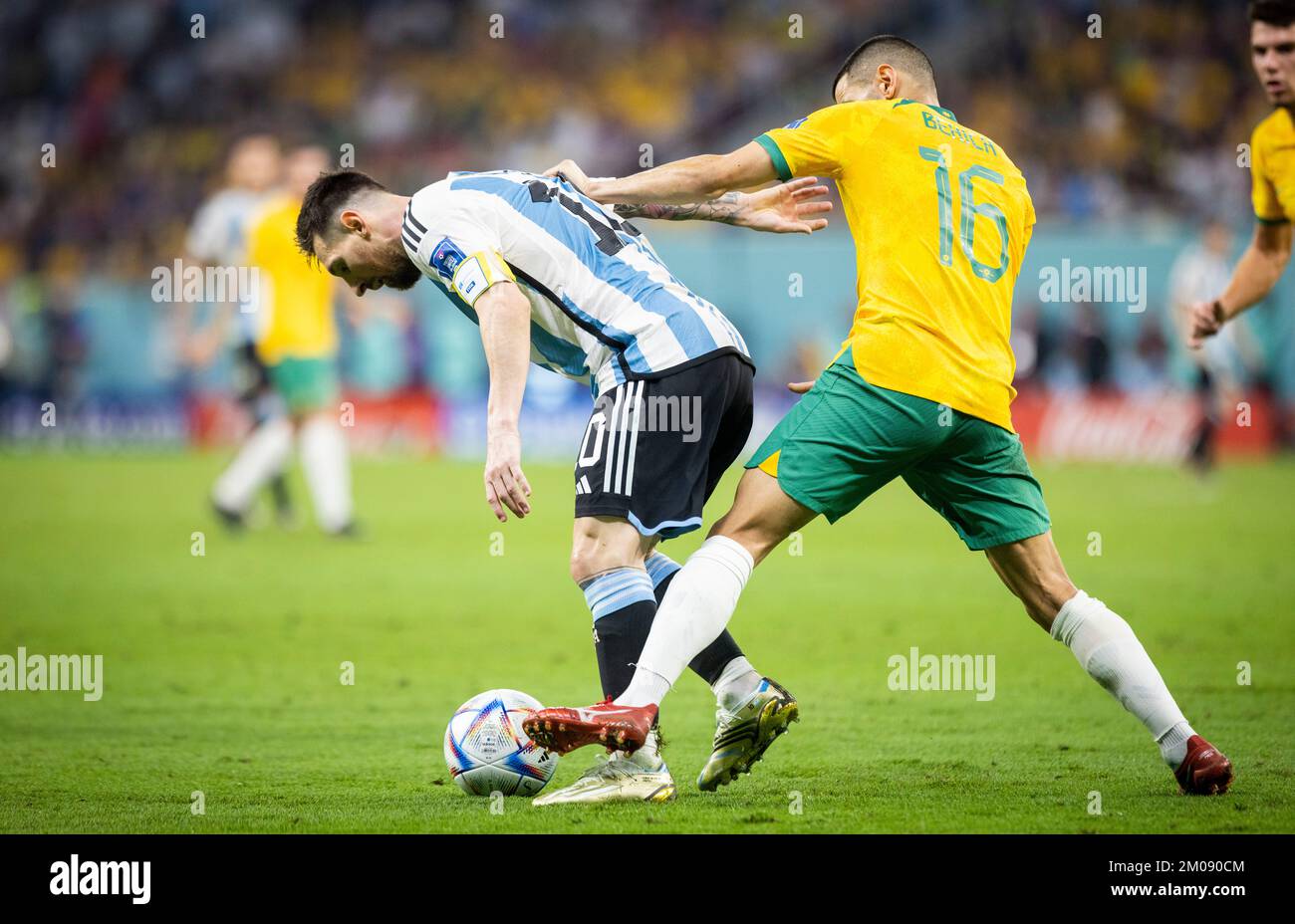Doha, Qatar. 3rd Dec, 2022. Lionel Messi (Arg), Aziz Behich (AUS ...