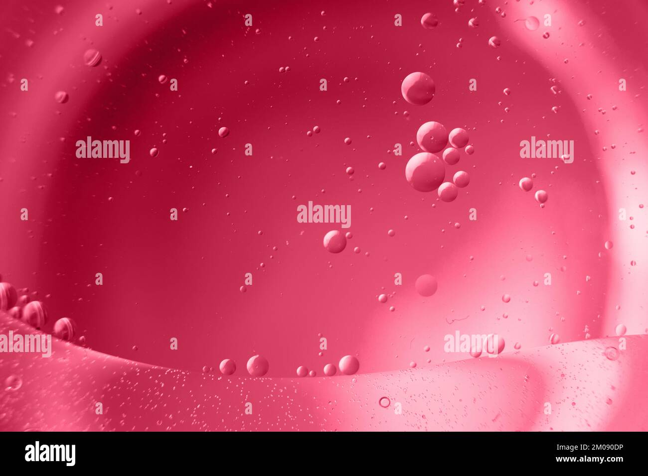 abstract light viva magenta background with oil circles . bubbles of ...