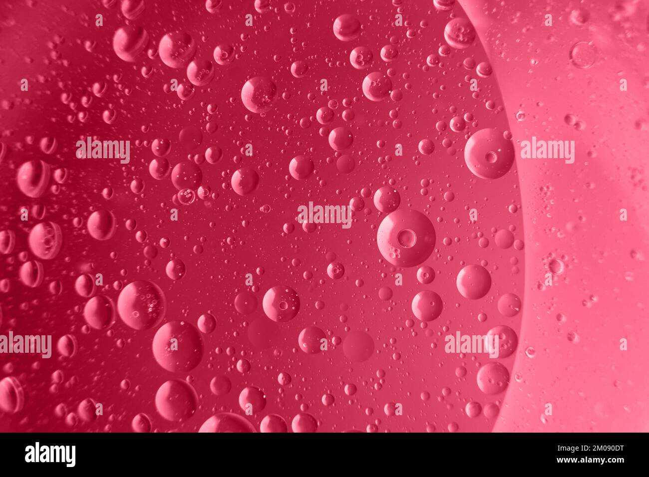 abstract light viva magenta background with oil circles . bubbles of ...