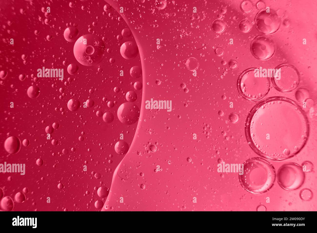 abstract light viva magenta background with oil circles . bubbles of ...