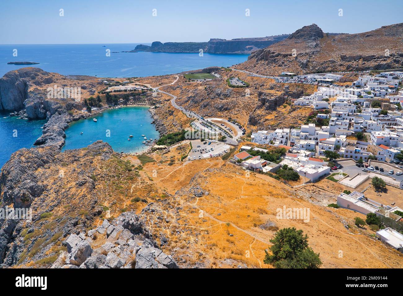Landscape Lindos bay with blue mediterranean sea, view from top of ...