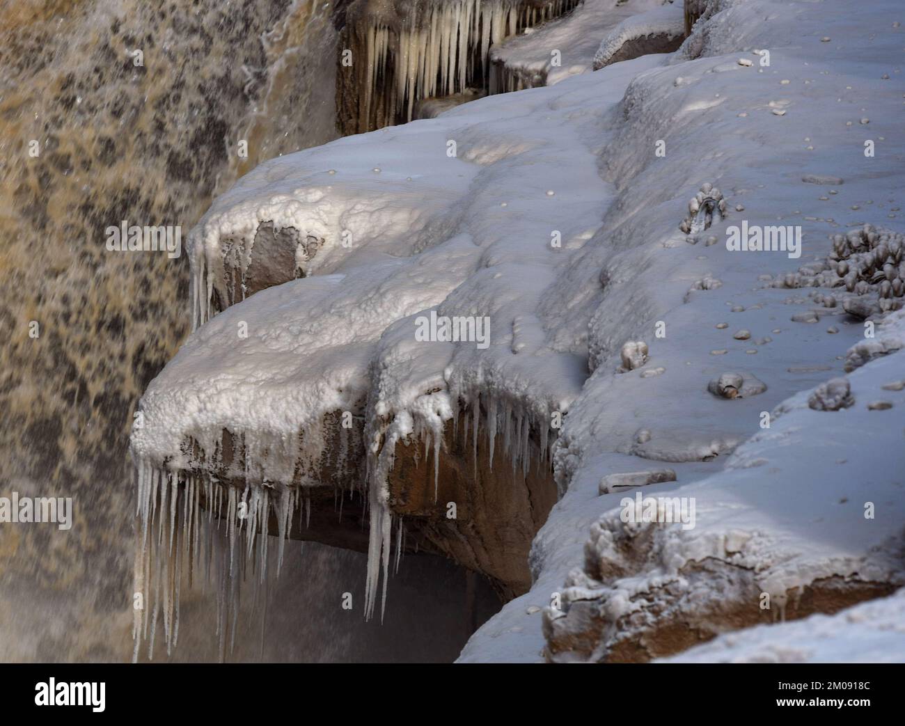 Aerial photos show the hanging ice scenery of Hukou Waterfall of the ...
