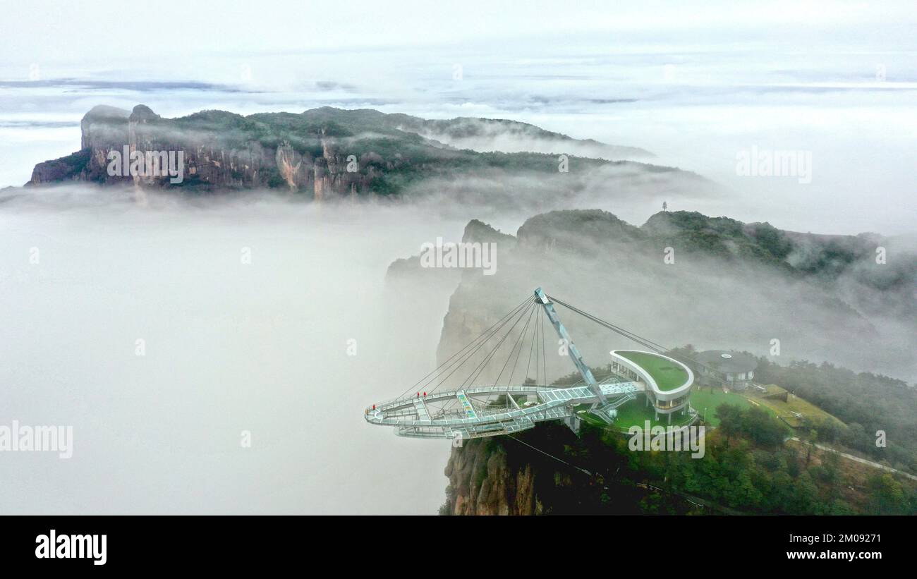 Aerial photos show the misty scenery of the Shenxianju Scenic Area ...