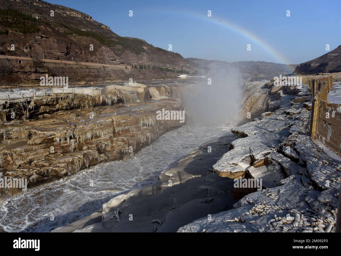 Aerial photos show the hanging ice and rainbow sceney of Hukou ...