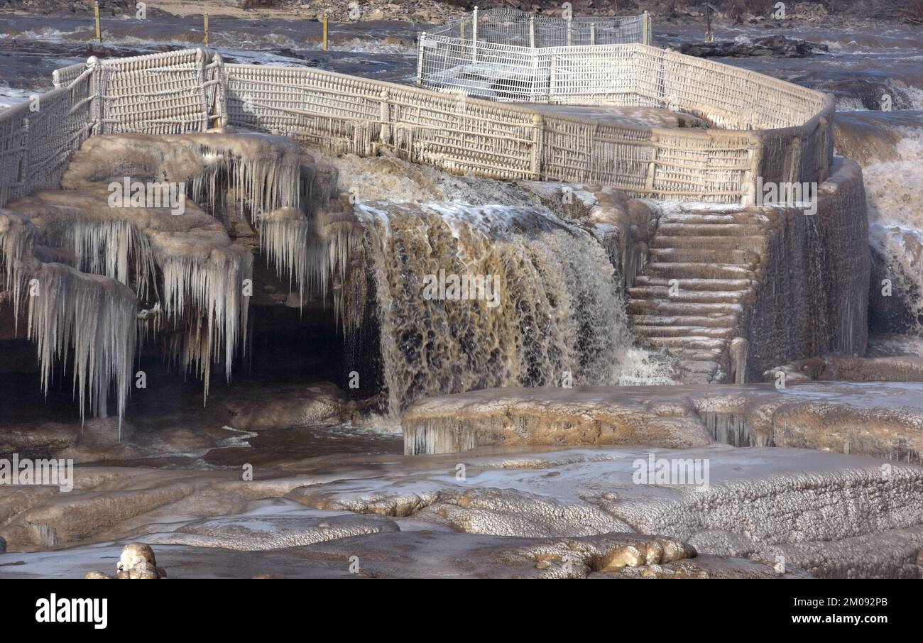 Aerial photos show the hanging ice scenery of Hukou Waterfall of the ...