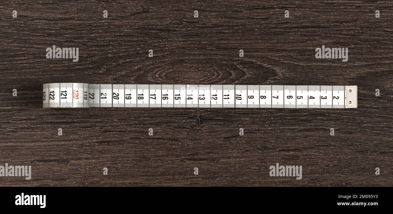 Measuring tape of tailor with indicators in form of centimeters. White ...