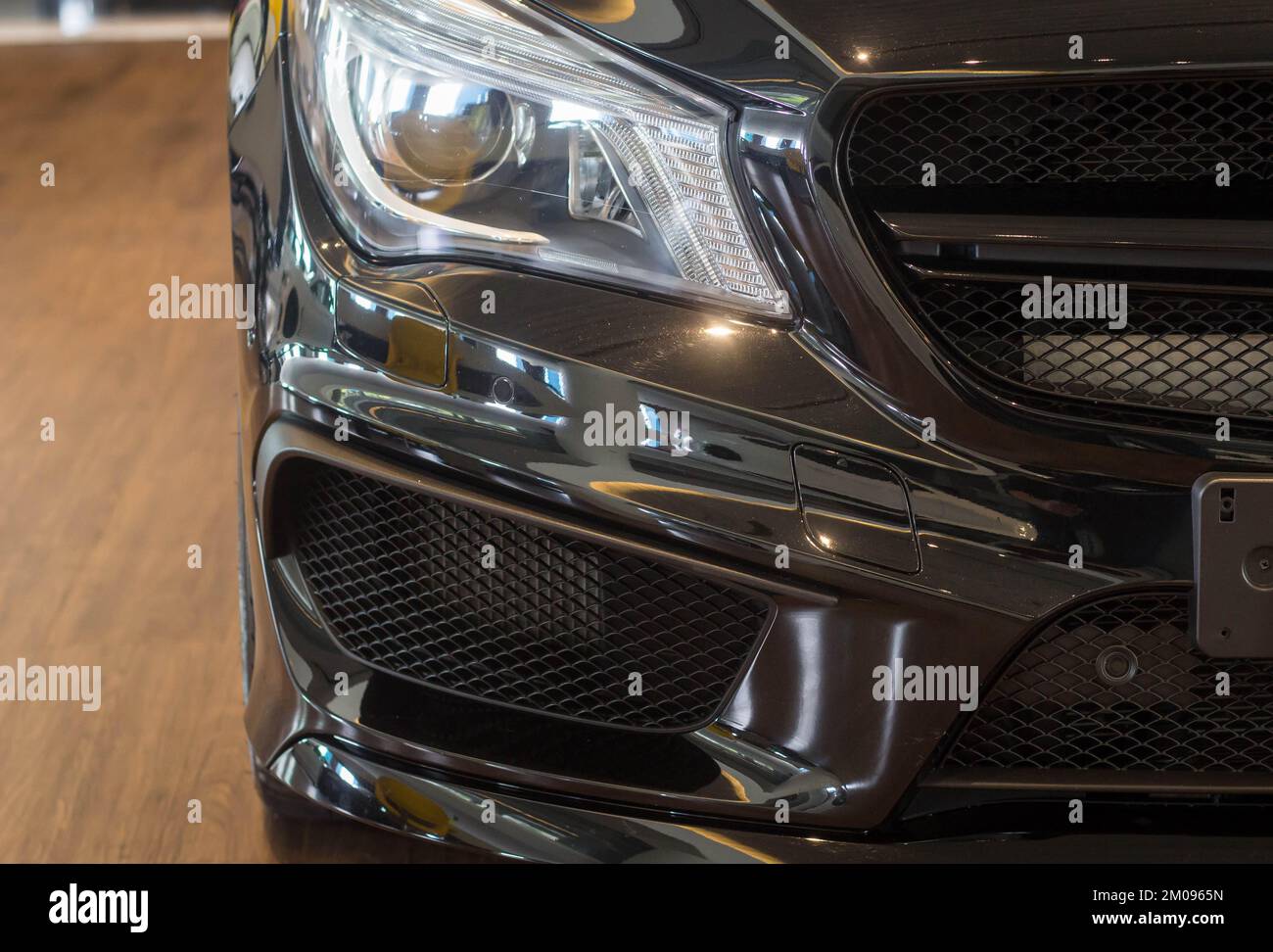 A black Mercedes-Benz AMG CLA 45 Headlight front end, right part of the ...