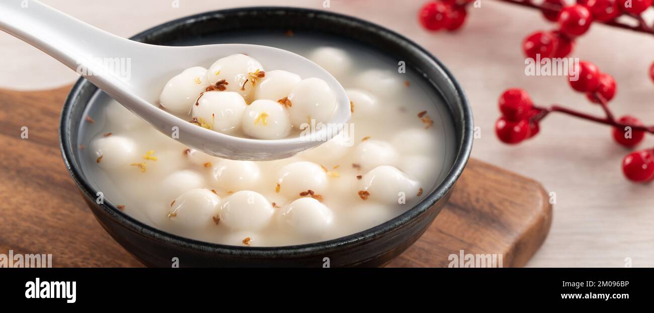 Little white tangyuan (tang yuan, glutinous rice dumpling balls) with ...