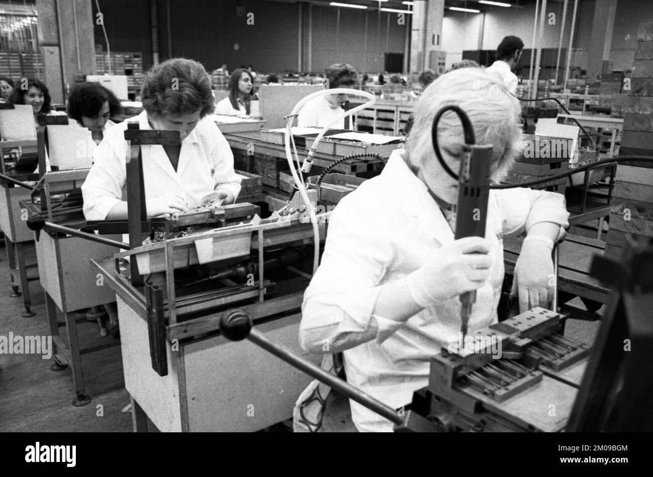 The production of electronic devices by female workers at the Siemens ...