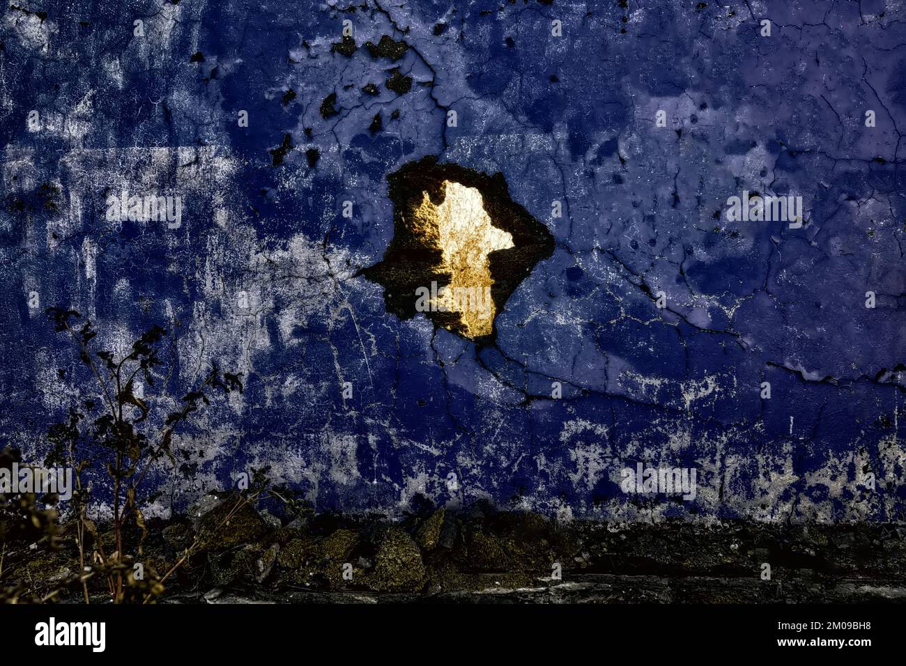 An abandoned house in the East. The wall is broken and a neglected ...