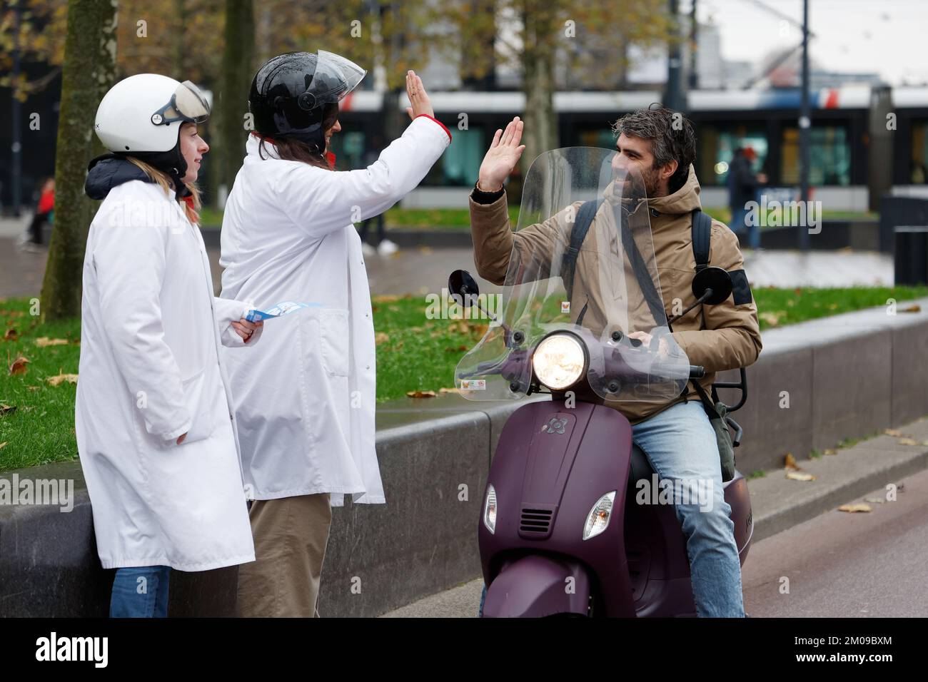 Light moped riders hi-res stock photography and images - Alamy