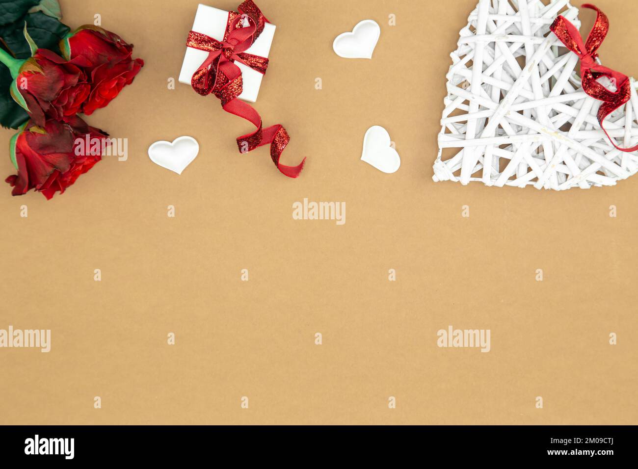 Valentine's Day background with rose bouquet and gift box, flat lay ...