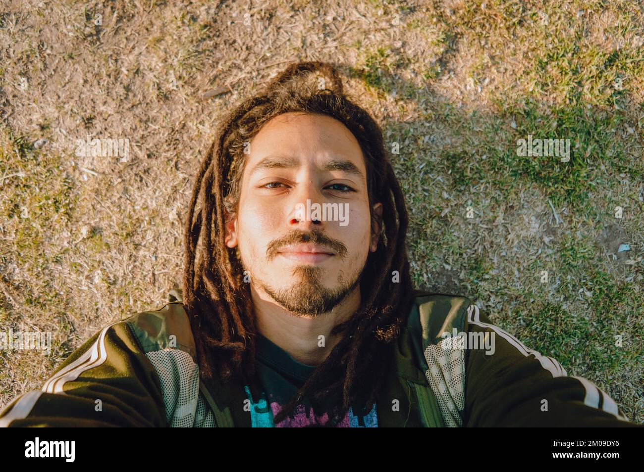 Selfie portrait of young caucasian venezuelan man with dreadlocks and ...