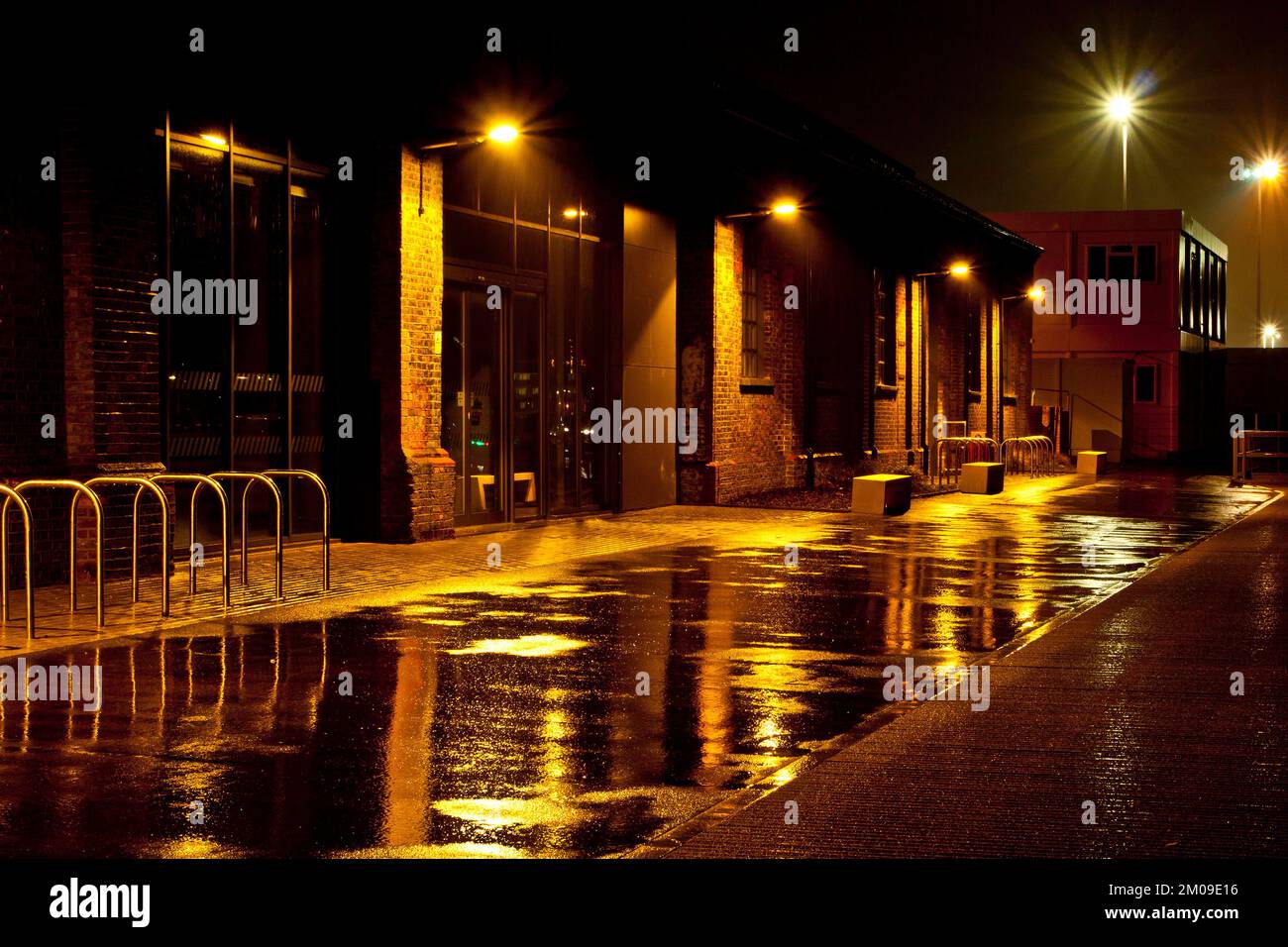 A Victorian building in the rain at night Stock Photo - Alamy