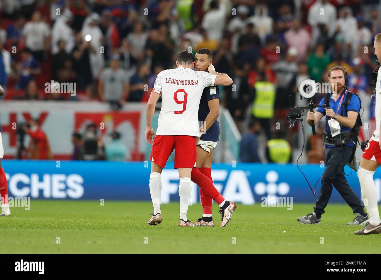 Doha, Qatar. 4th Dec, 2022. (L-R) Robert Lewandowski (POL), Kylian ...