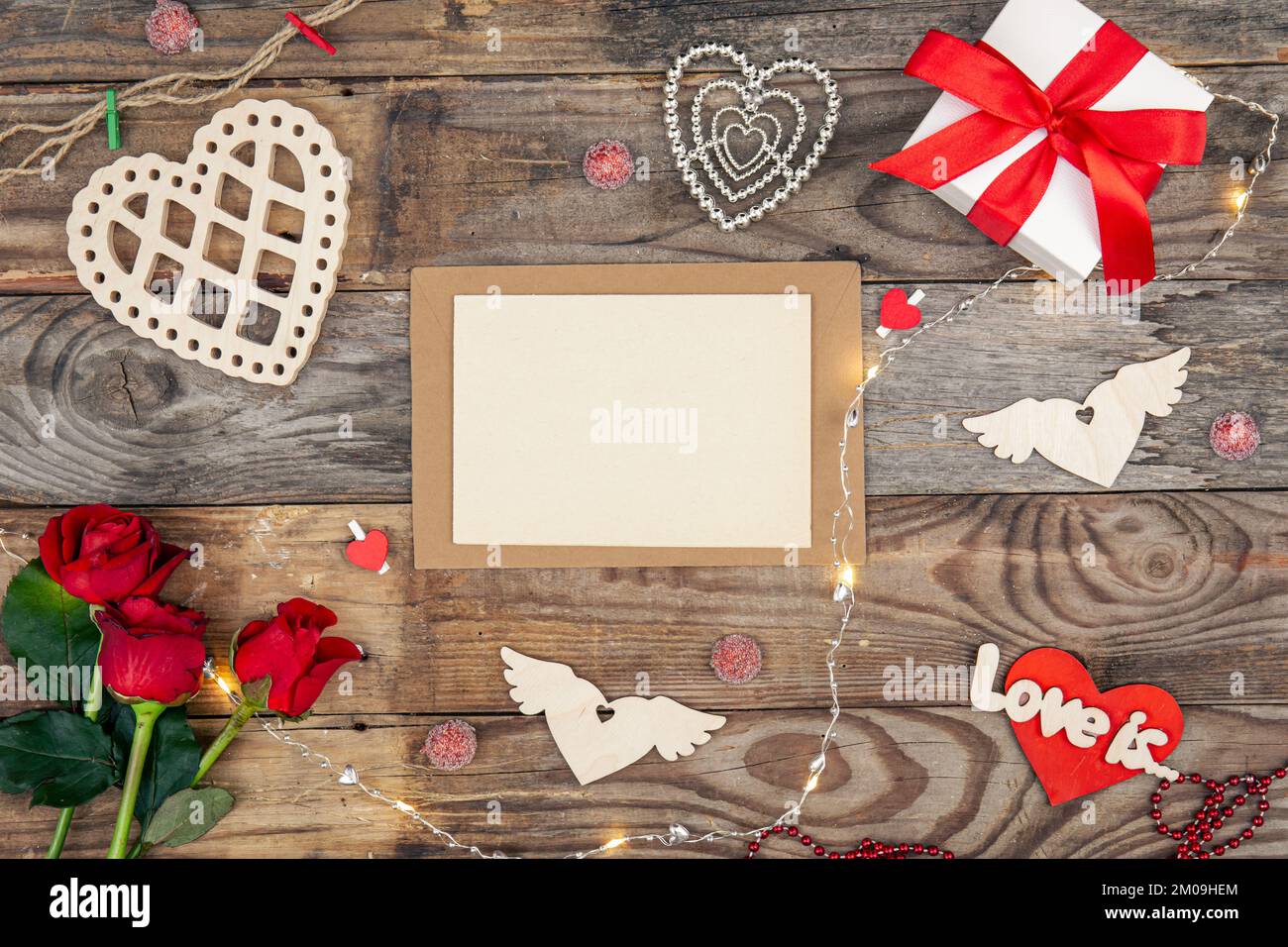 Envelope and blank paper on wooden background, Valentine's day concept ...